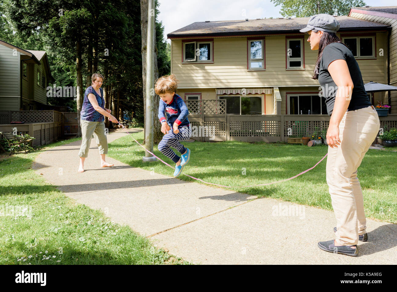 Boy skipping rope hi-res stock photography and images - Alamy