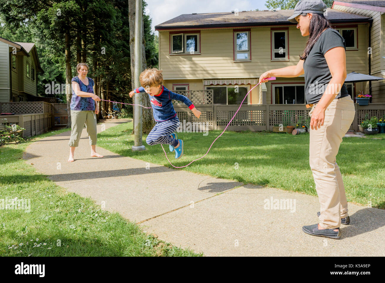 Boy skipping rope hi-res stock photography and images - Alamy