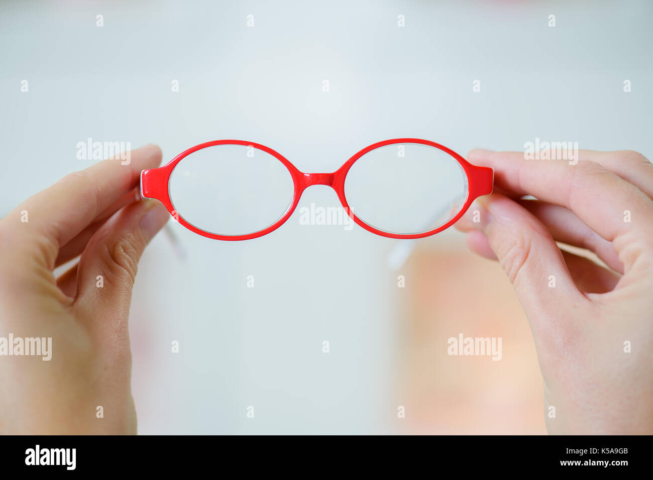 glasses in hand Stock Photo - Alamy