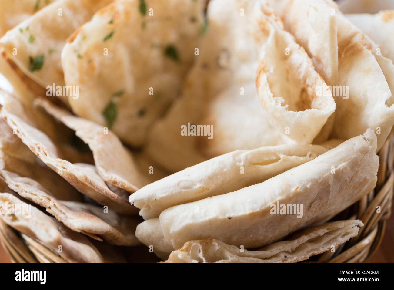 Indian cuisine, variety of roti in basket Stock Photo - Alamy