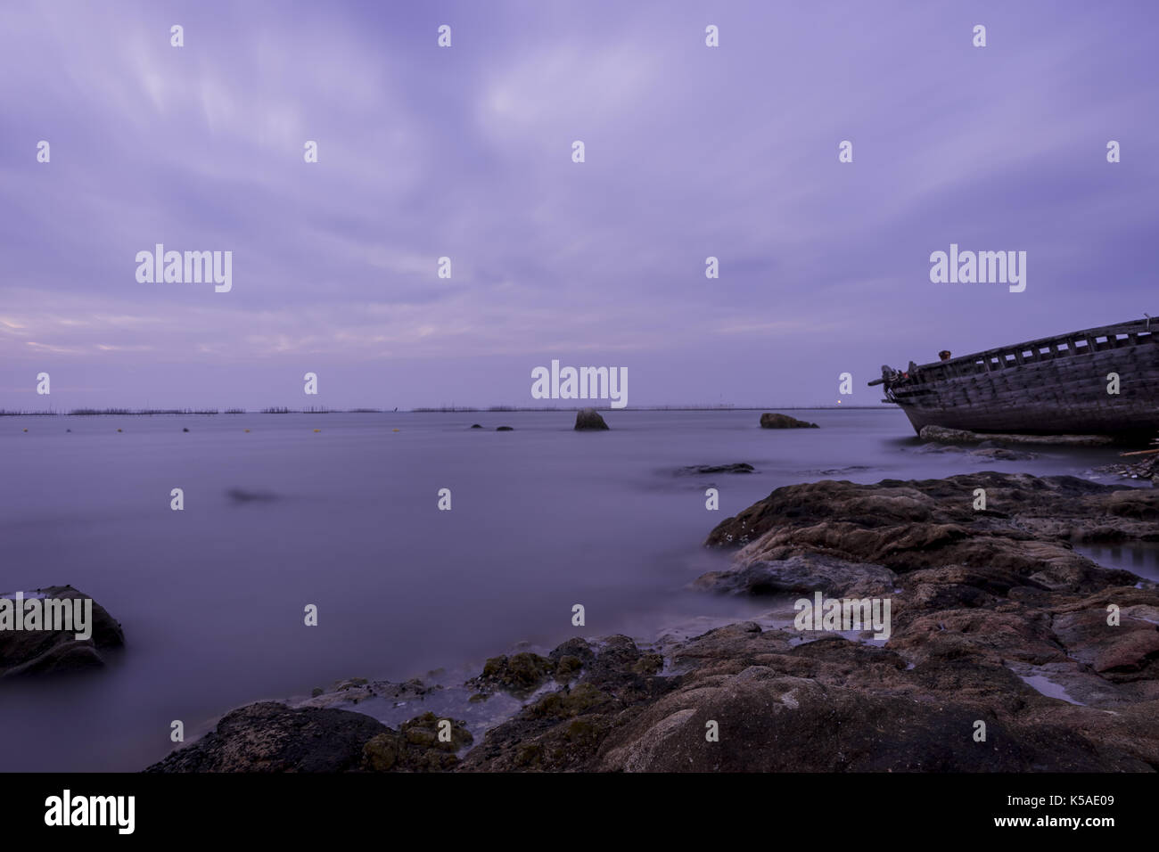 Ocean at sunset time in Thailand, slow shutter speed give a beautiful ...