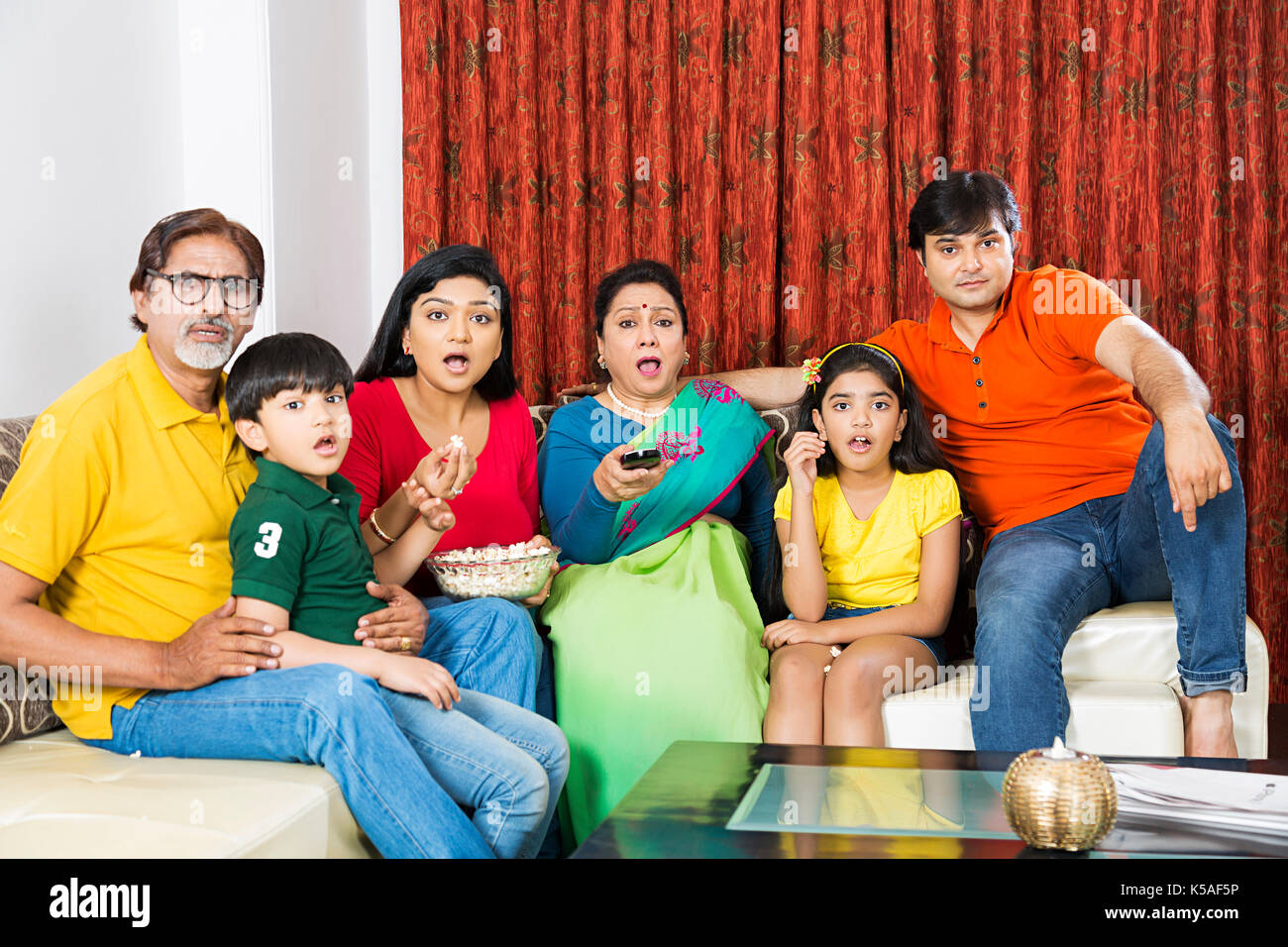 Indian group joint family sitting hi-res stock photography and images ...