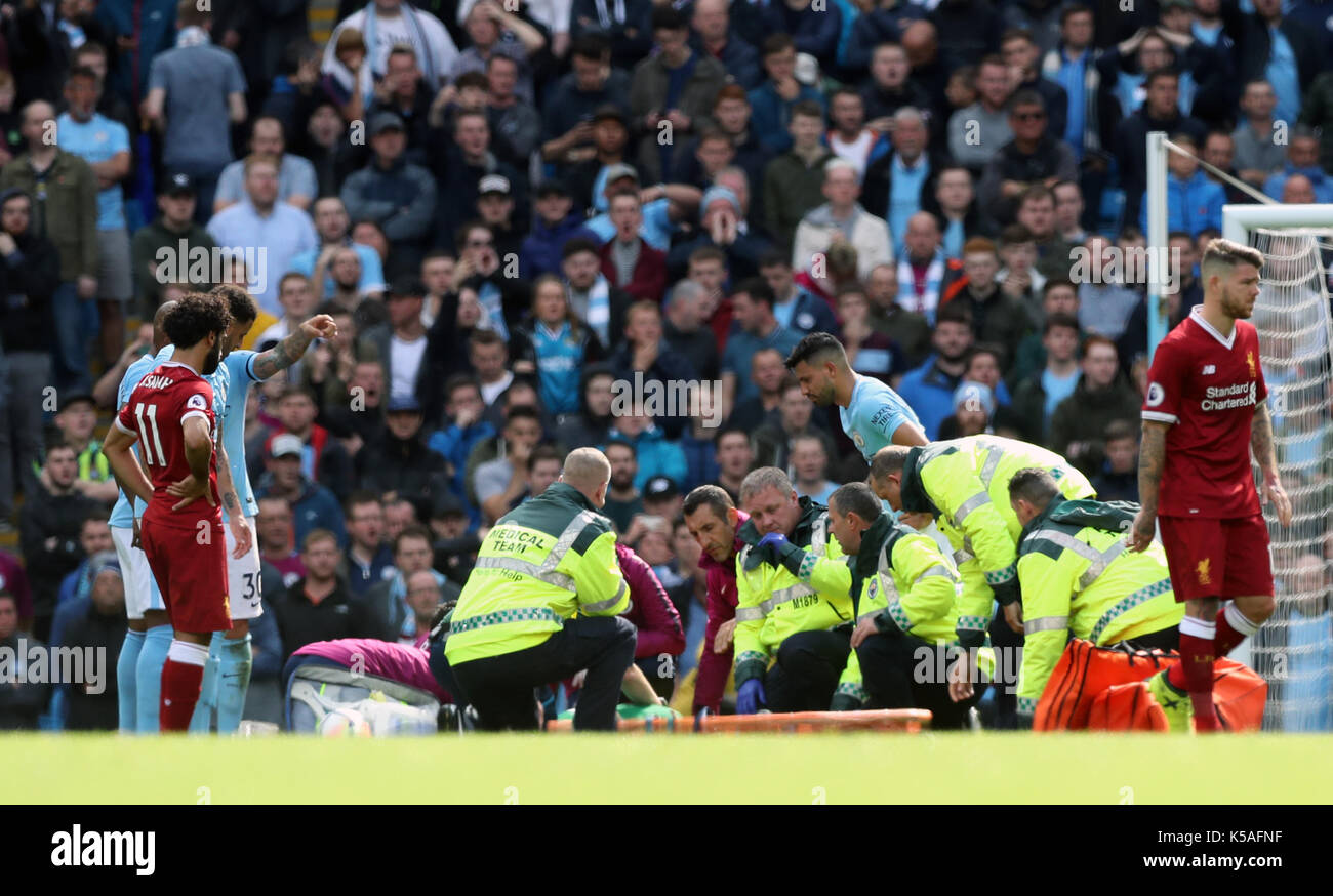 Manchester City goalkeeper Ederson receives treatment for an injury ...