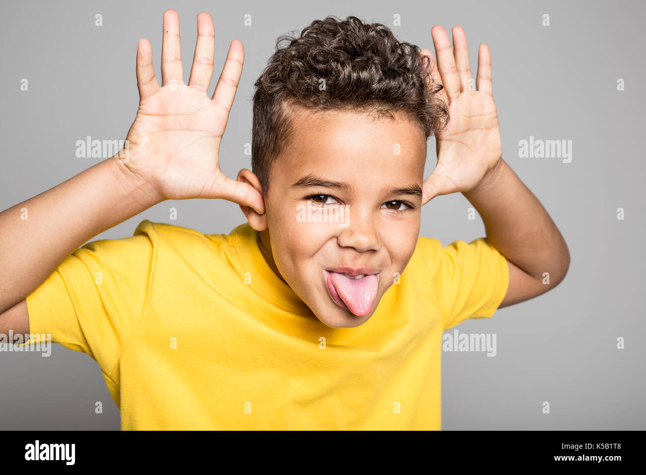 African child tongue hi-res stock photography and images - Alamy