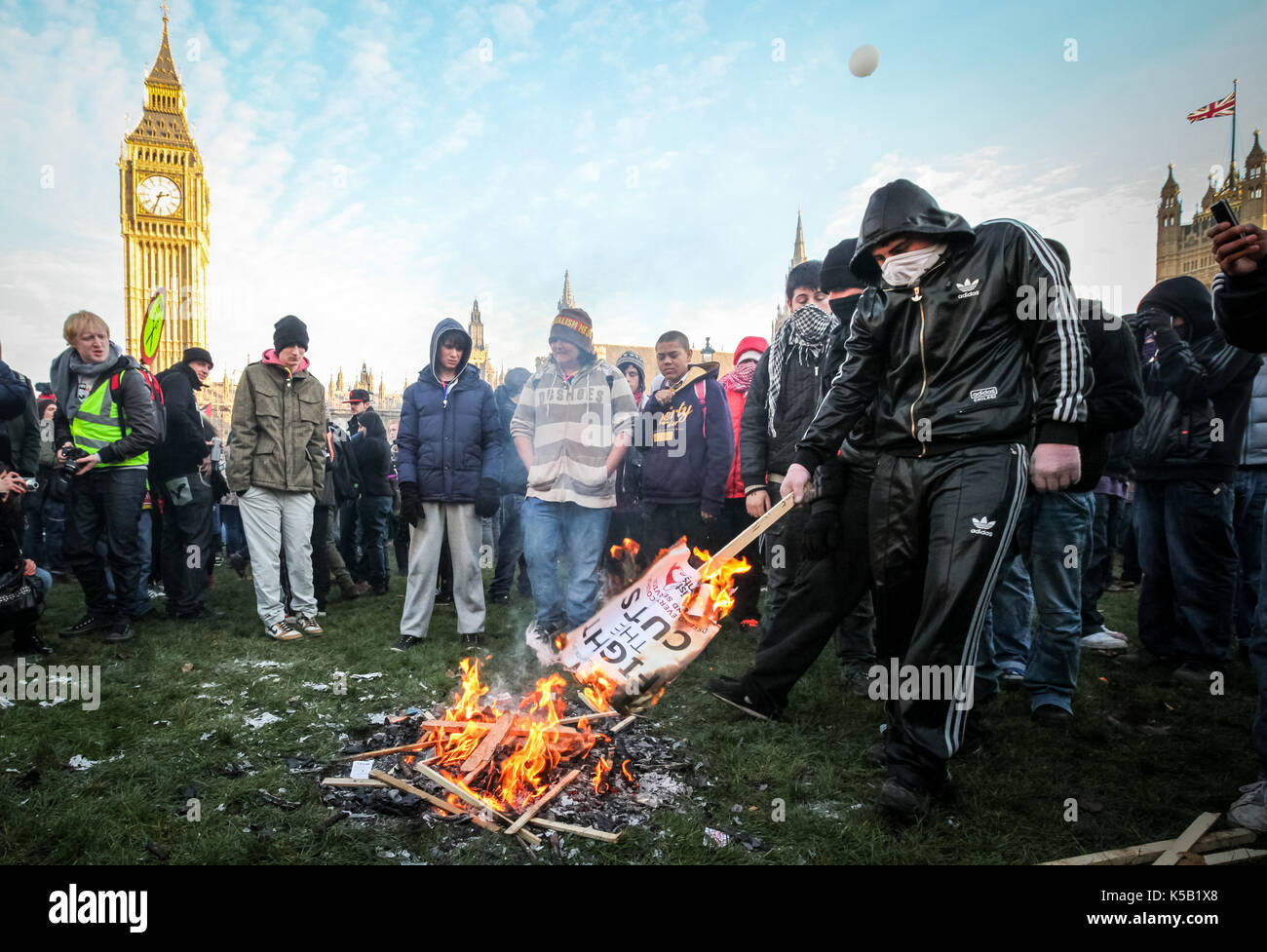 Burning placards. Mass student protests and civil unrest in London ...