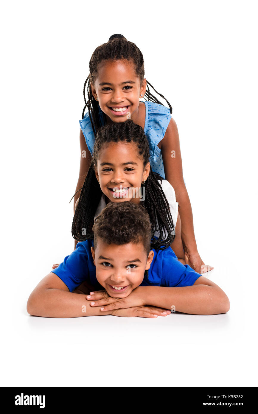 portrait of happy three black childrens, white background Stock Photo ...