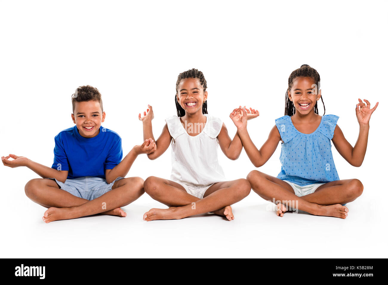 portrait of happy three black childrens, white background Stock Photo ...