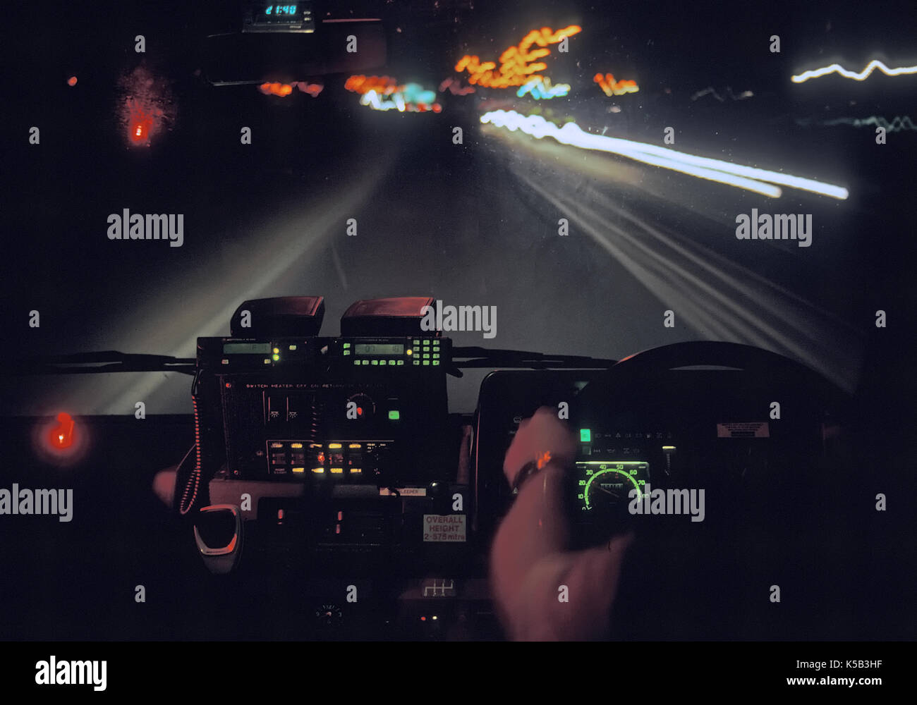 Cab interior of an ambulance on the road at night - with motion blur ...