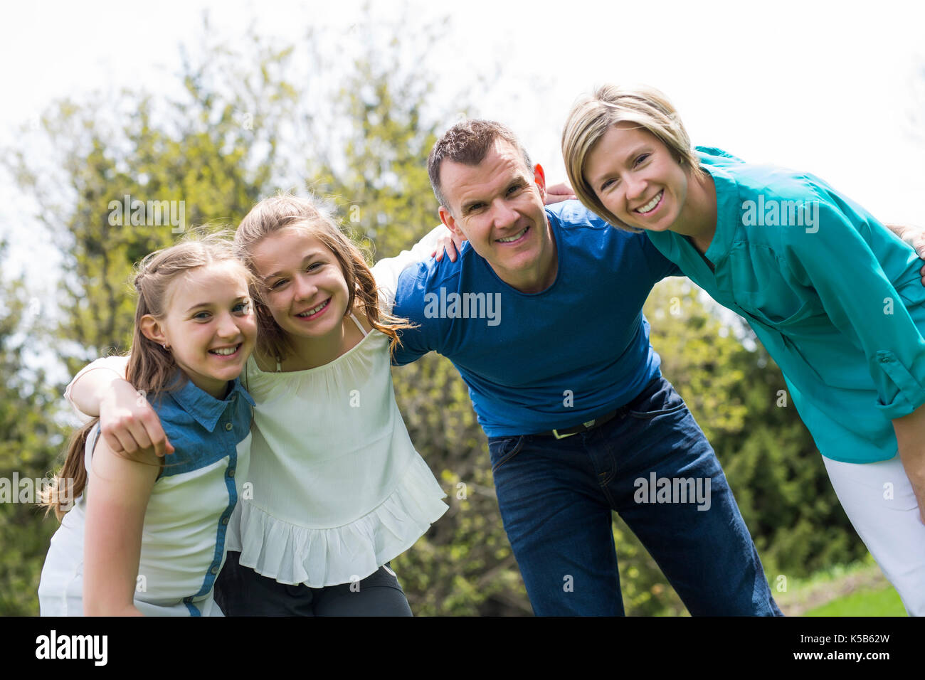 family together outside Stock Photo - Alamy
