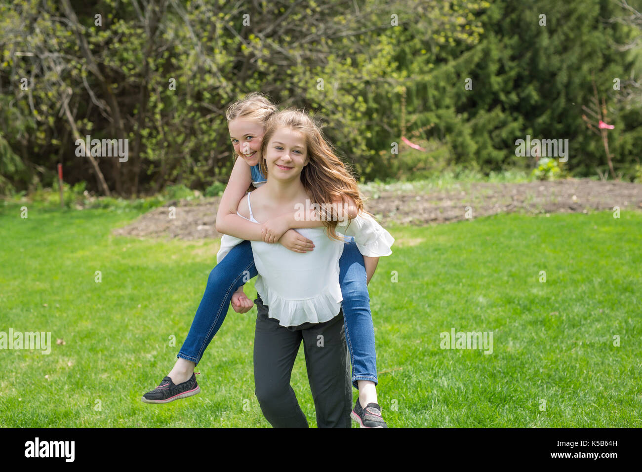 Teenage girls having fun together outdoors Stock Photo - Alamy