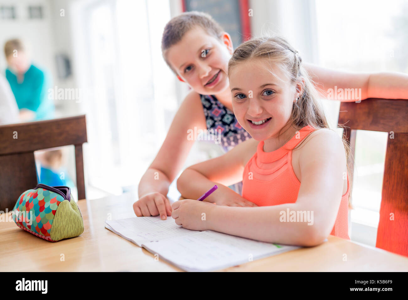 cute teen girl doing homework at home Stock Photo - Alamy