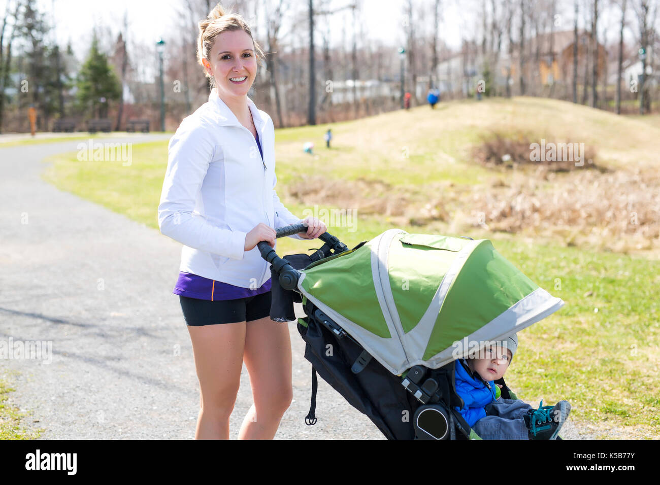 Mother doing Training, jogging with baby Stock Photo - Alamy