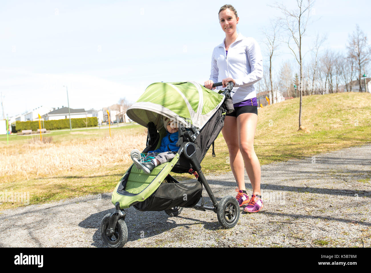 Mother doing Training, jogging with baby Stock Photo - Alamy