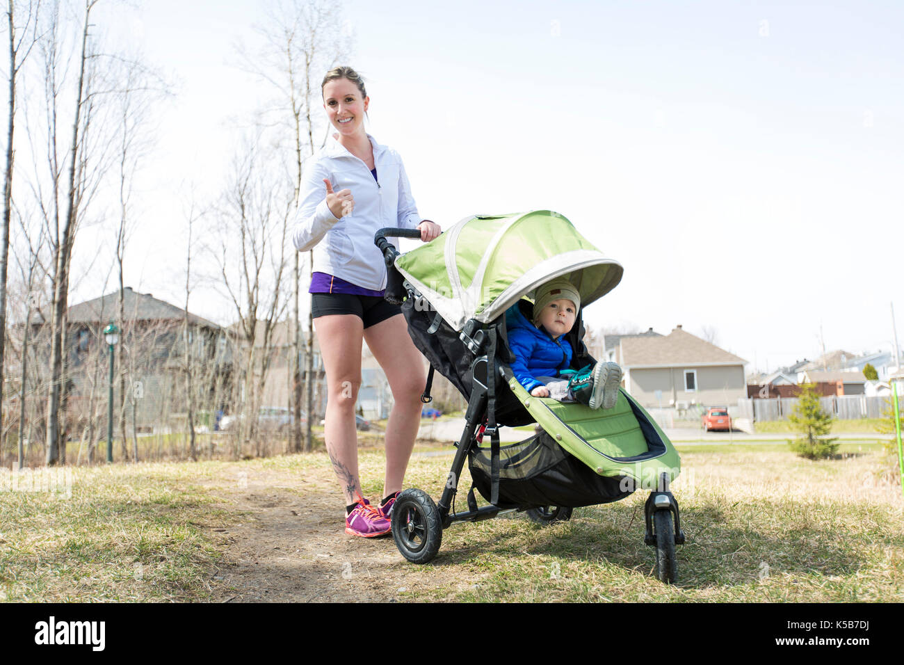 Mother doing Training, jogging with baby Stock Photo - Alamy