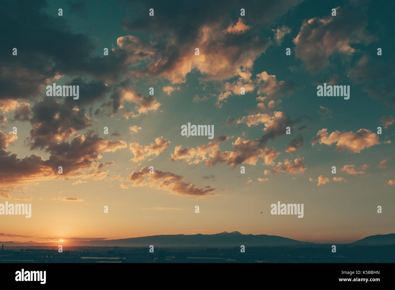 Clouds at sunset Stock Photo - Alamy