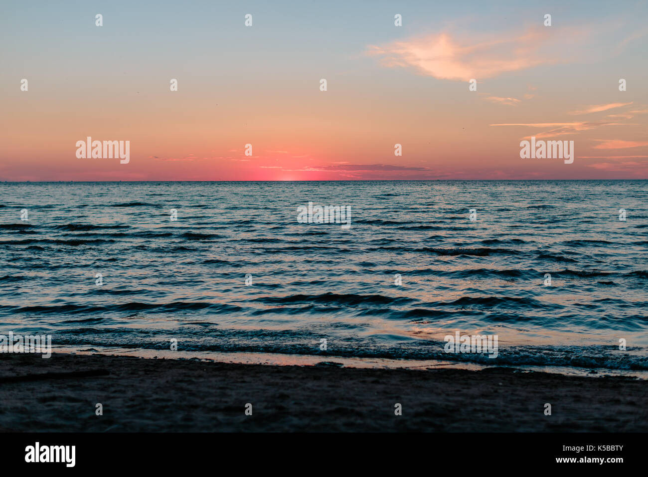 On the beach after sunset Stock Photo - Alamy