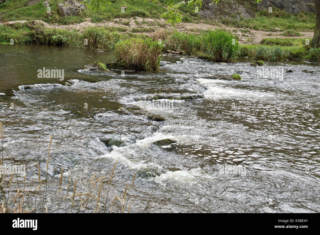 River flowing over rocks Stock Photo - Alamy