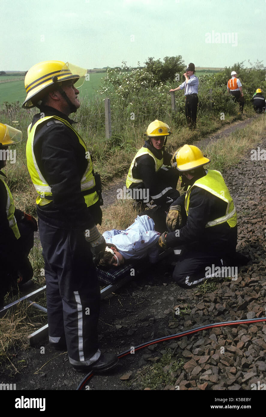 Emergency service attending an exercise involving a train crash Stock ...