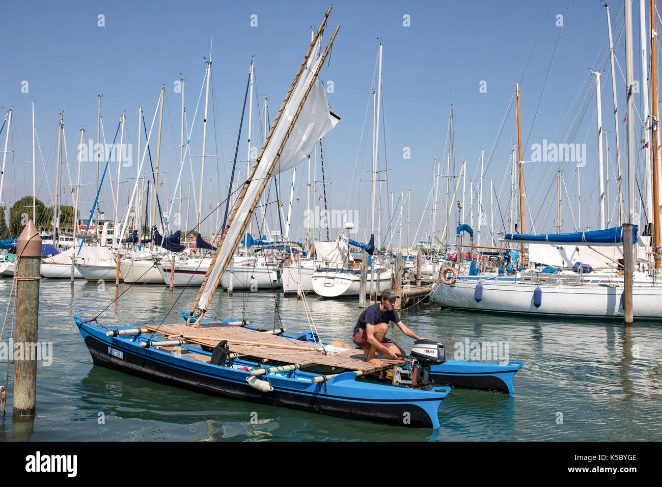 Self made catamaran. Marina in Venice, yachts, sail boats. Romantic ...