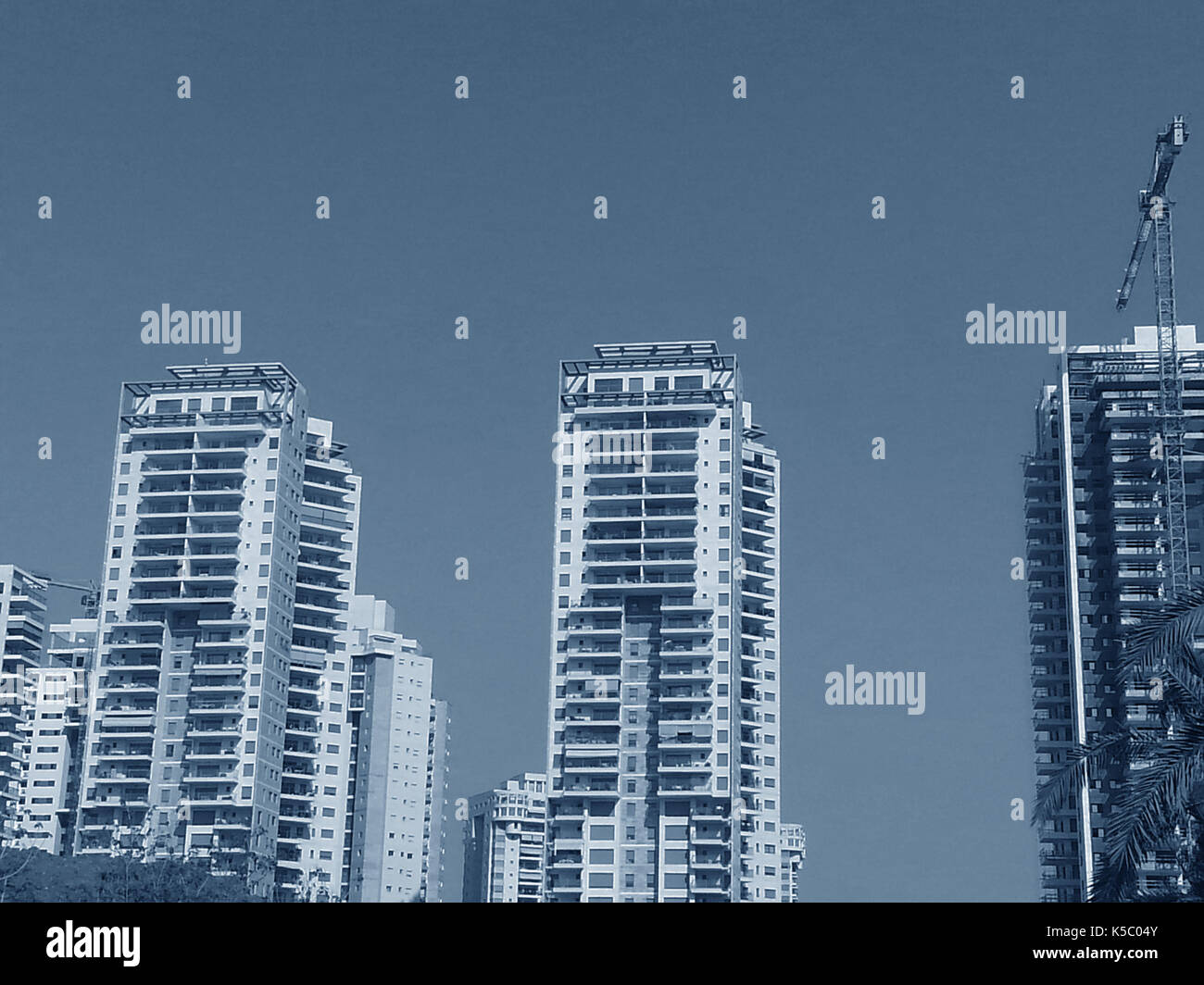 Blue Toned building condominium structure pattern city Stock Photo - Alamy