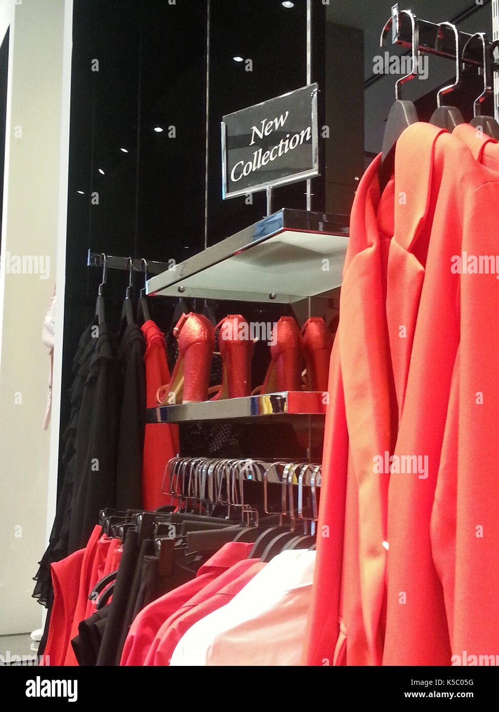 New collection sign on shopping Center Shelf Stock Photo - Alamy