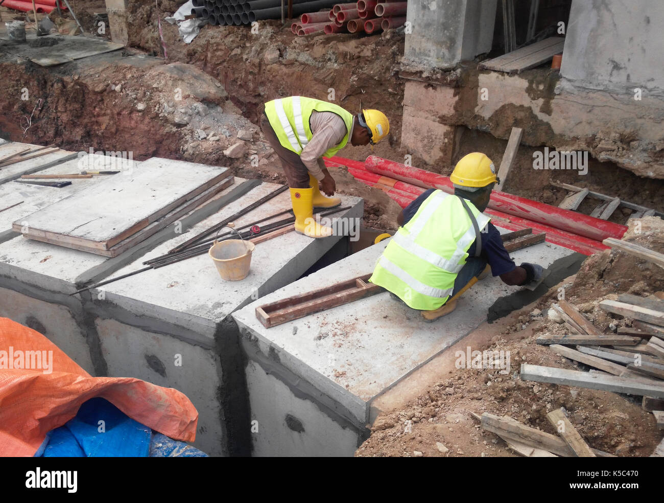SELANGOR, MALAYSIA -MARCH 18, 2017: Construction workers install ...