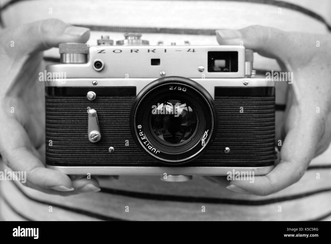 Photographer woman retro camera Black and White Stock Photos & Images ...