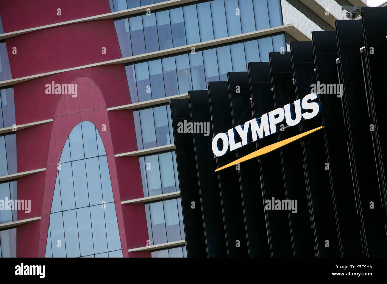 A logo sign outside of a facility occupied by the Olympus Corporation ...