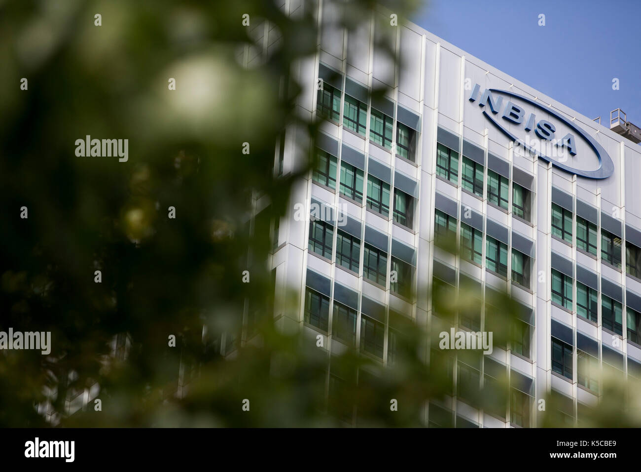 A logo sign outside of the headquarters of INBISA Construccion in ...