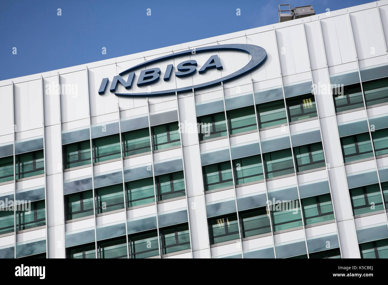 A logo sign outside of the headquarters of INBISA Construccion in ...