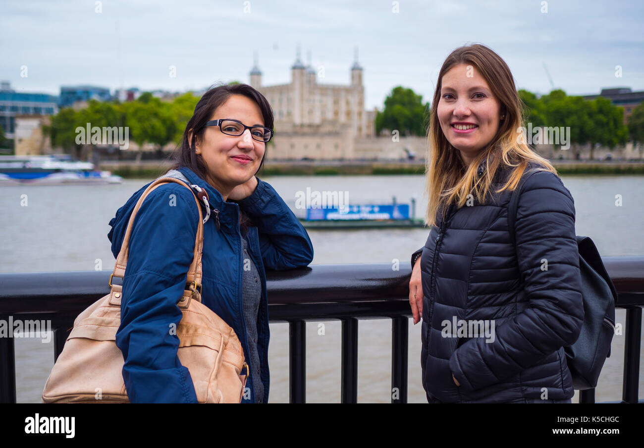 Two girls on a sightseeing trip to London Stock Photo - Alamy