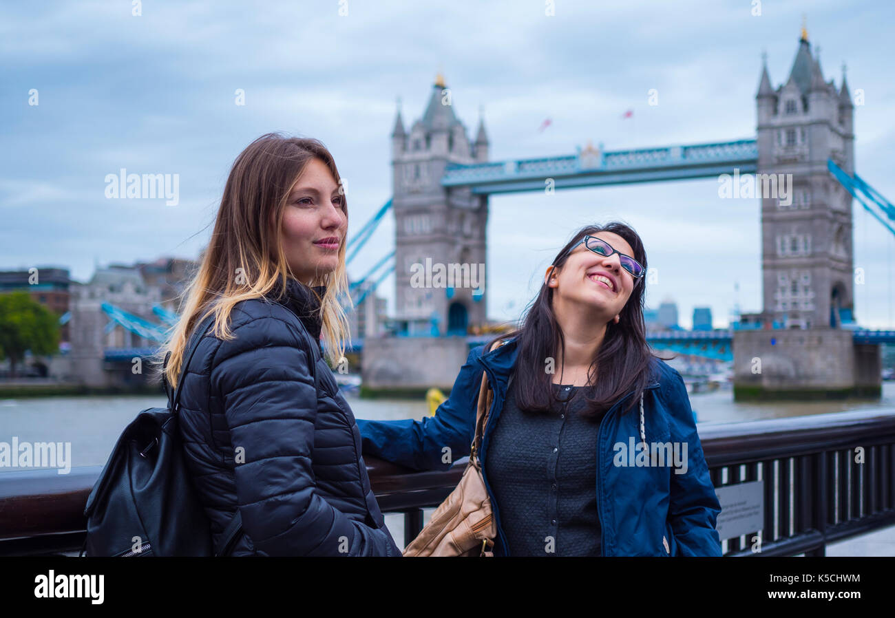 Two girls on a sightseeing trip to London Stock Photo - Alamy