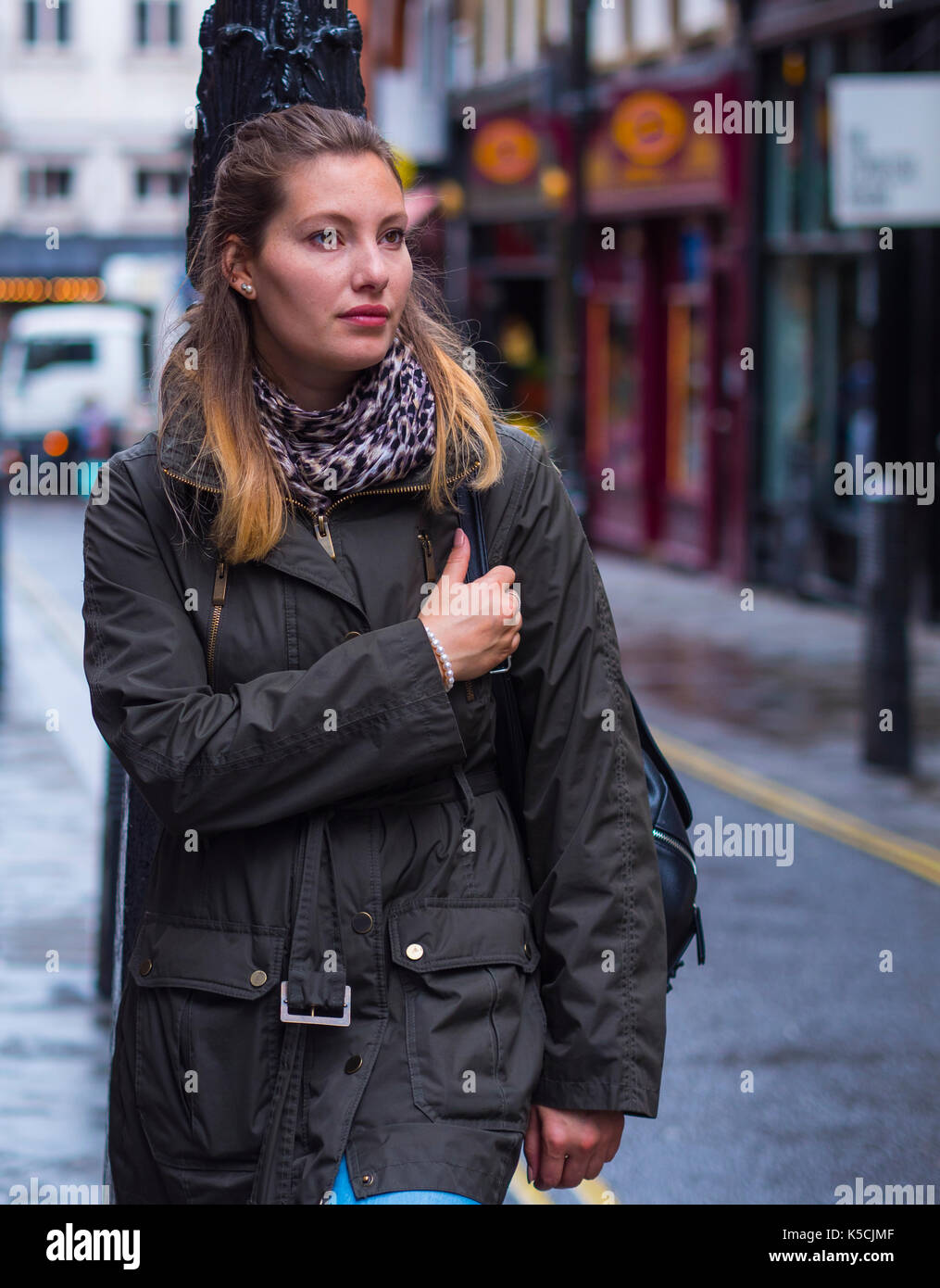 Young girl in the streets of London - relaxing from sightseeing Stock ...
