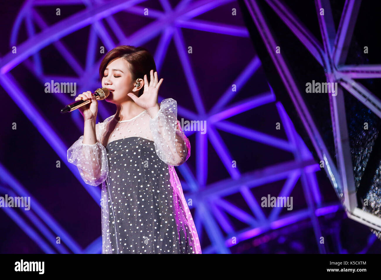 Malaysian singer Fish Leong performs during the concert for Alibaba ...