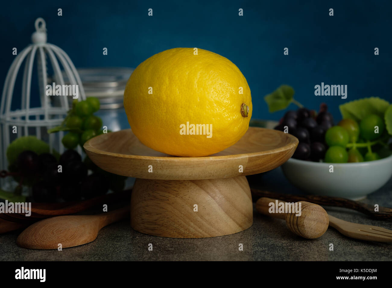 Still life with lemons on rustic low key background, Choose focal point ...