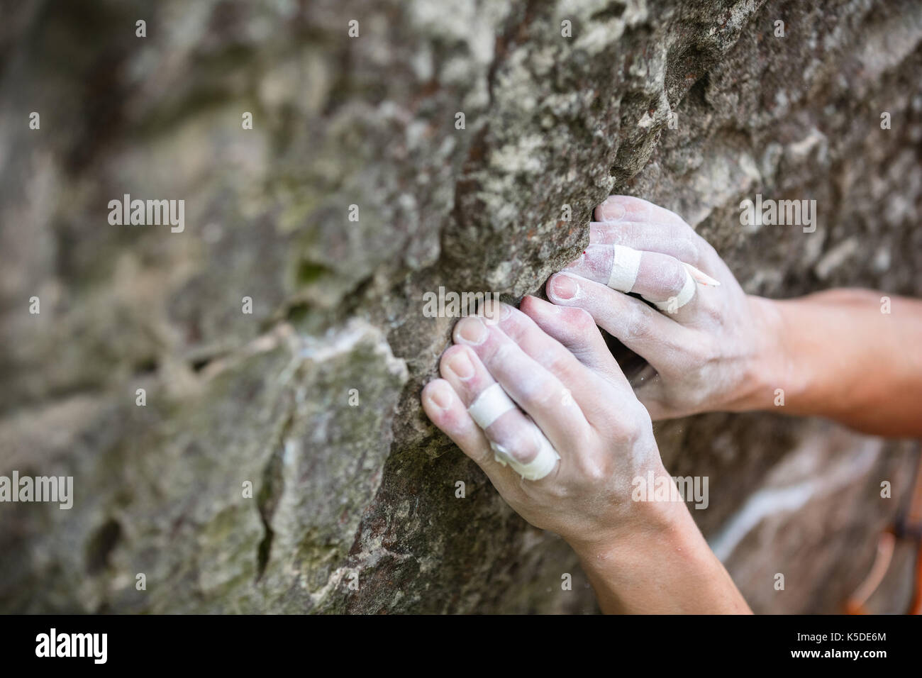 Hands gripping wall hi-res stock photography and images - Alamy