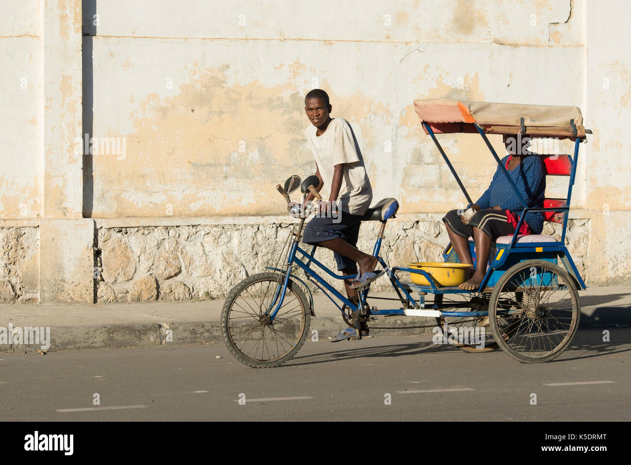 Pousse-pousse is the main transport in Toliara, Madagascar Stock Photo ...
