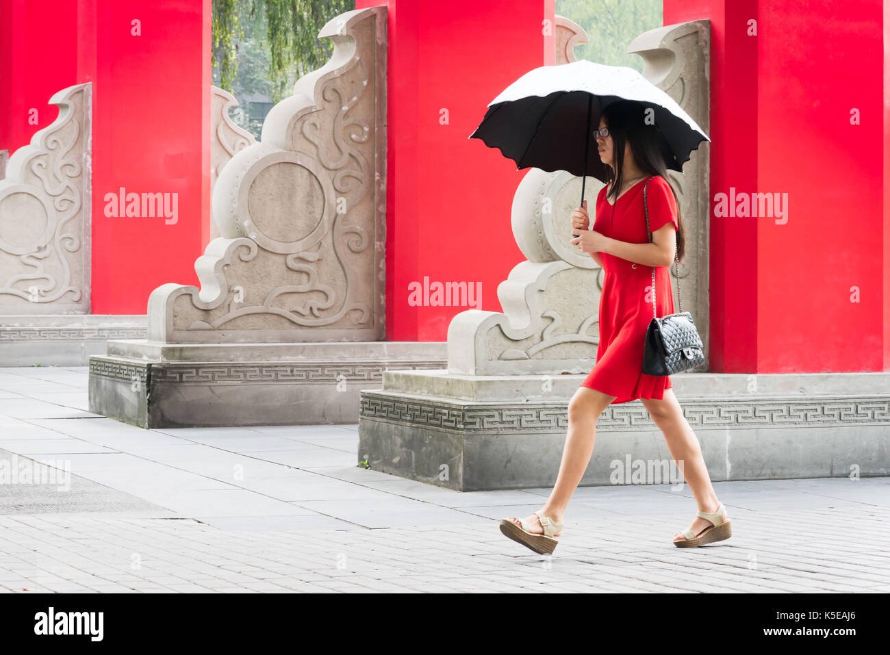 Student with red dress Stock Photo - Alamy