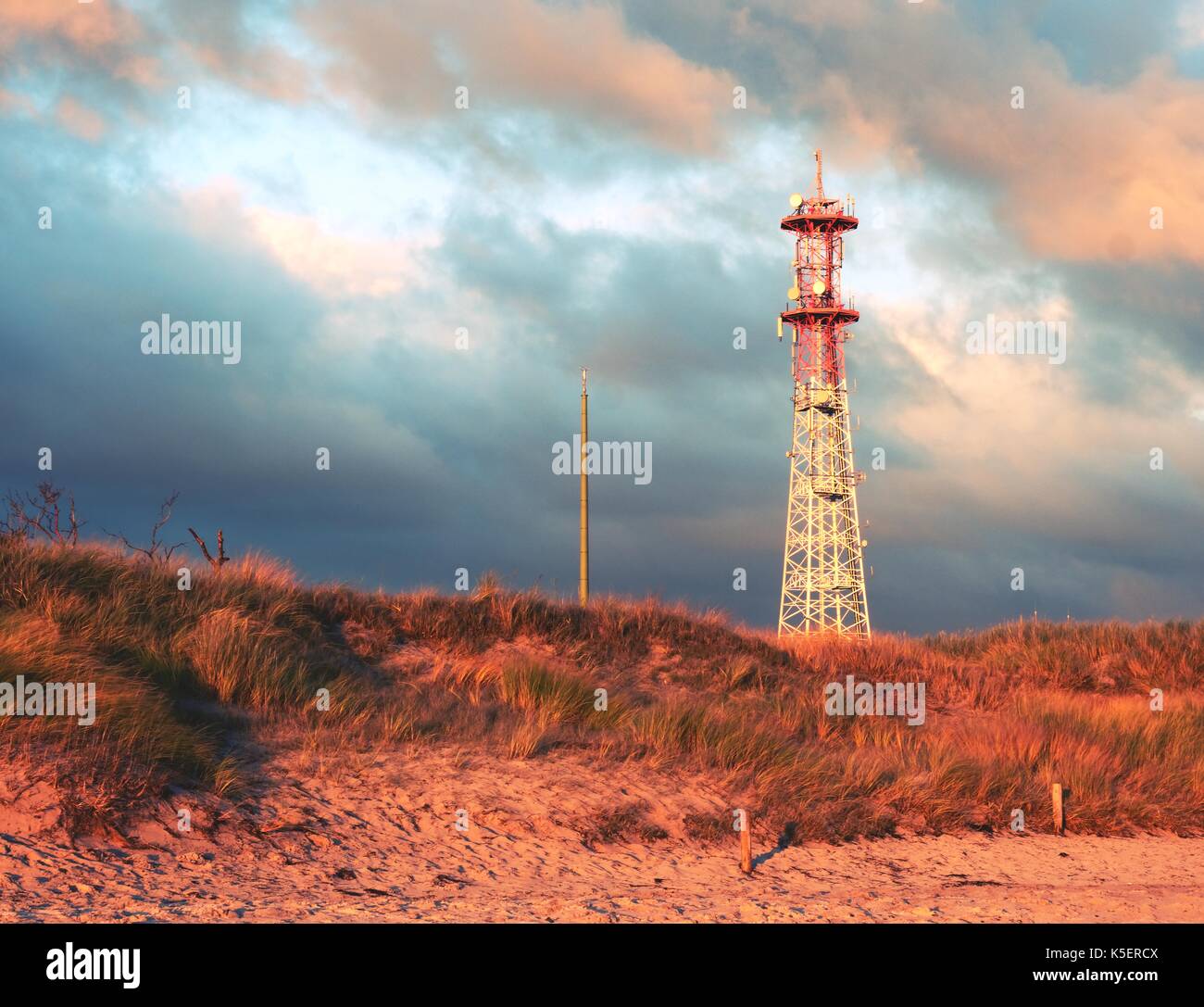 Meteorological tower station, steel construction at sea offshore. Dunes ...