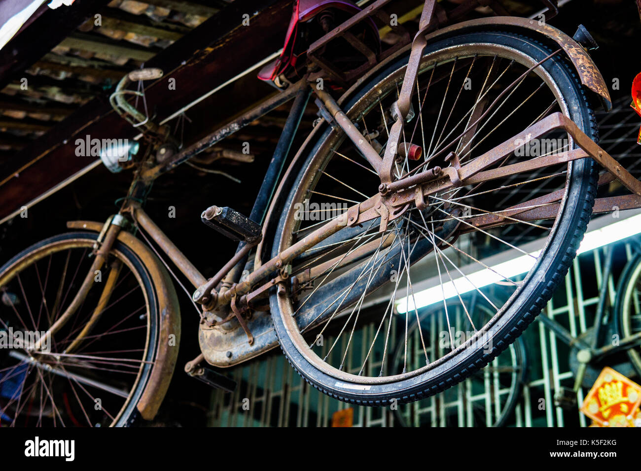 Hanging bicycle hi-res stock photography and images - Alamy