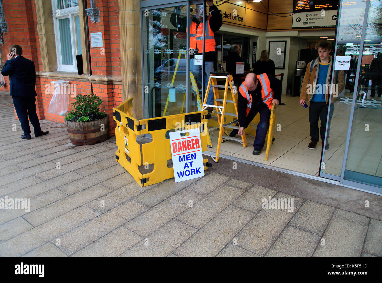 Men at Work Danger sign notice, train railway station, Colchester ...