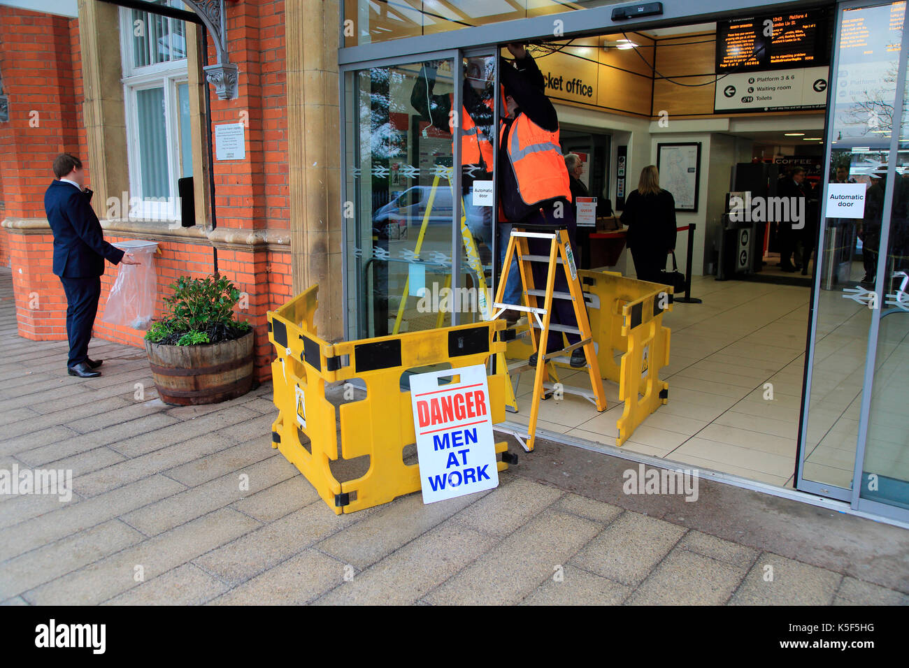 Men at Work Danger sign notice, train railway station, Colchester ...