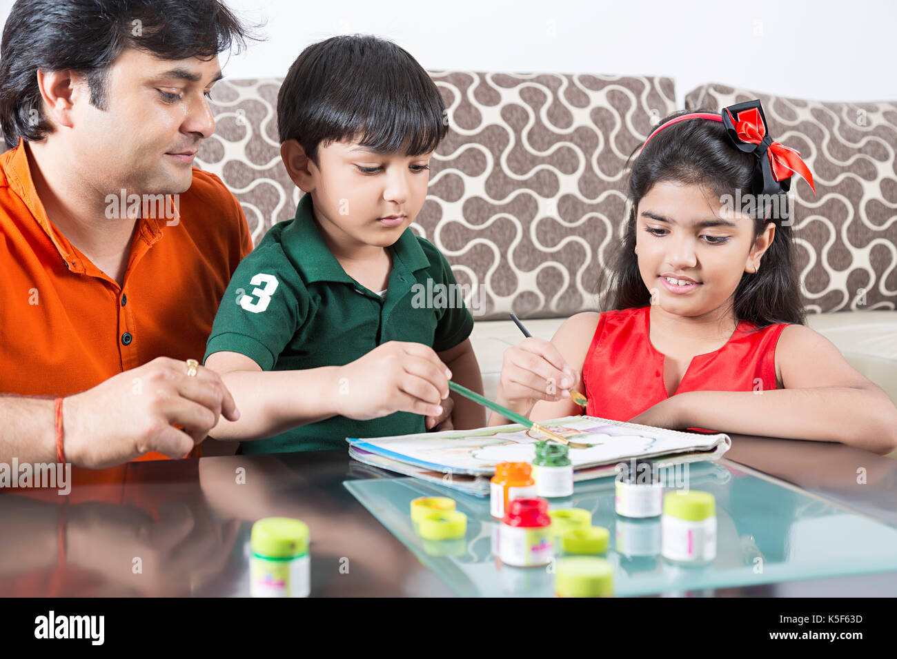 Helping painting hi-res stock photography and images - Alamy