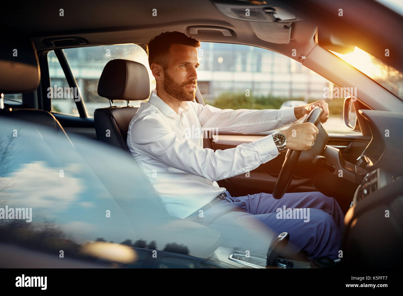 Young success businessman driving car Stock Photo - Alamy Young success businessman driving car Stock Photo - Alamy