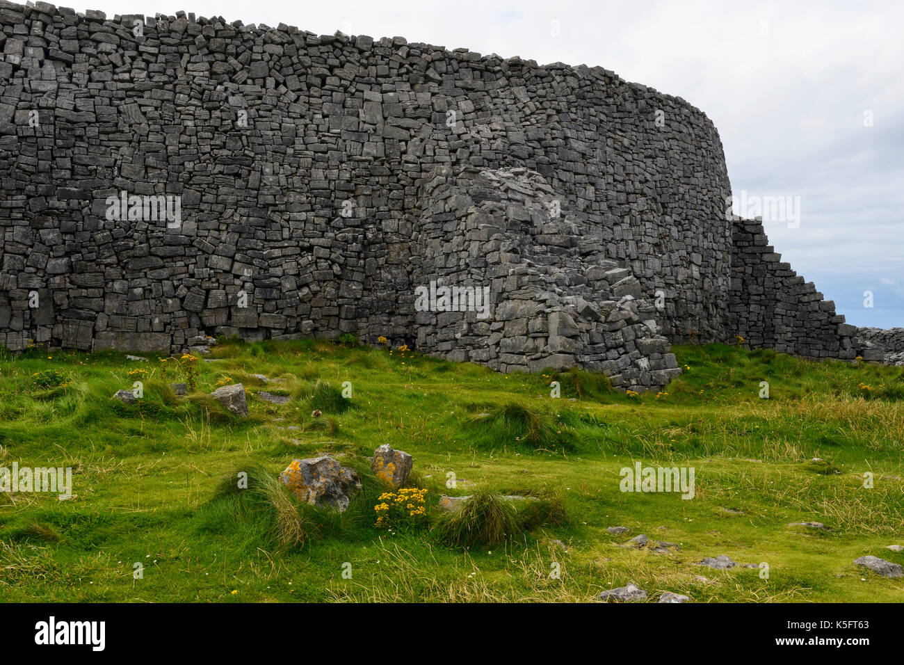 Gigantic dry stone wall of Dun Aonghasa, a prehistoric stone fort on ...
