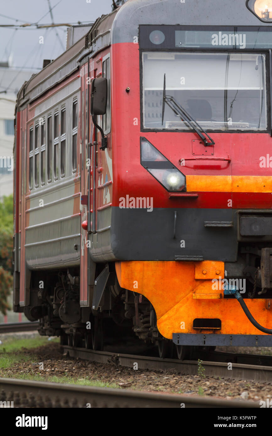 Rail way - big iron red - passenger train, vertical Stock Photo - Alamy
