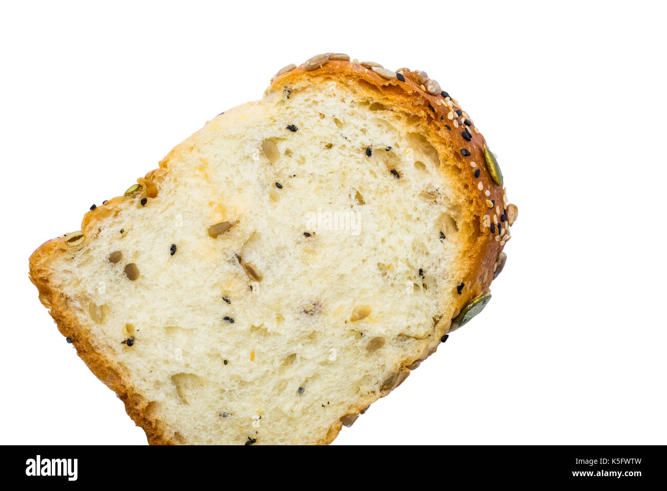 Close up of whole wheat bread on white background Stock Photo - Alamy