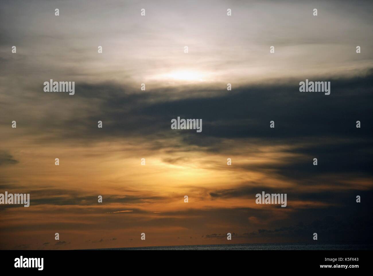 sunset view of a beach in bali, indonesia Stock Photo - Alamy