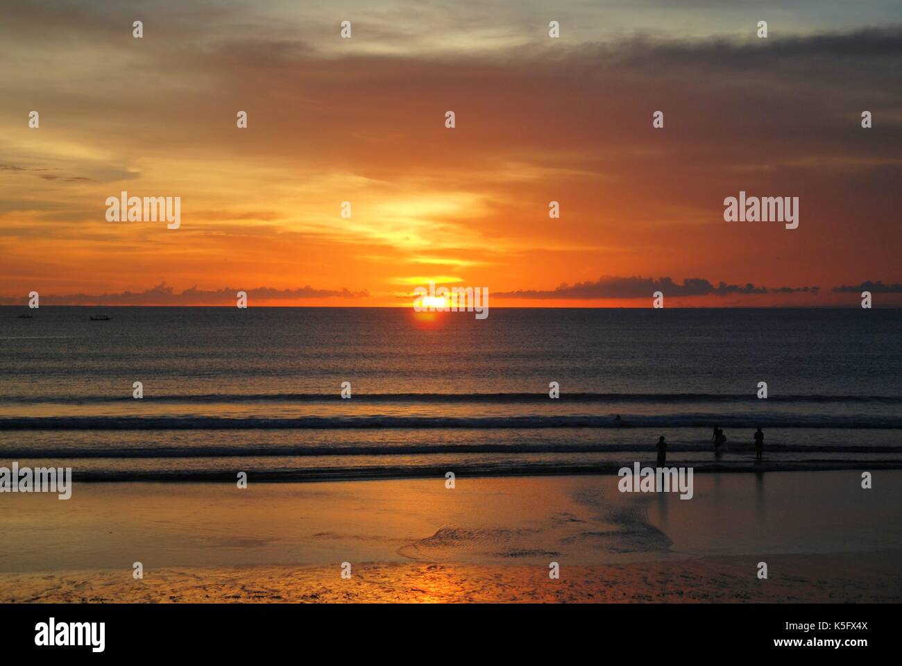 sunset view of a beach in bali, indonesia Stock Photo - Alamy