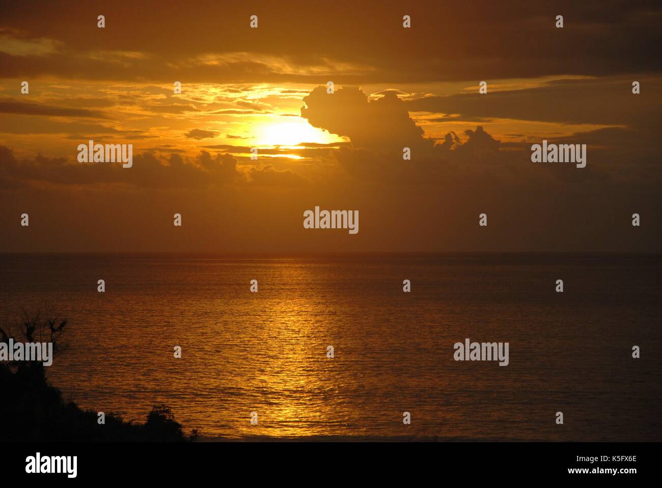 sunset view of a beach in bali, indonesia Stock Photo - Alamy